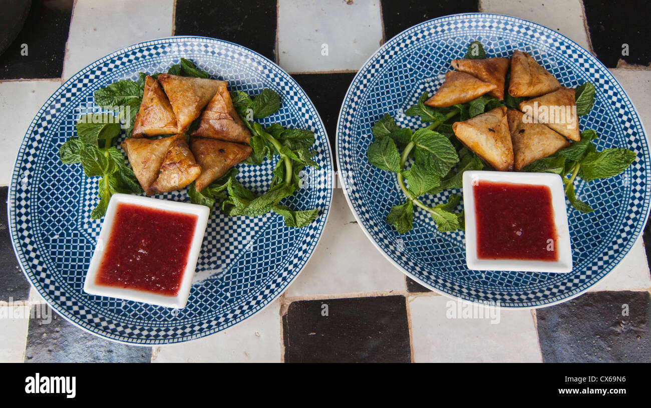 pastilla, Moroccan spring rolls, in Marrakech, Morocco Stock Photo - Alamy