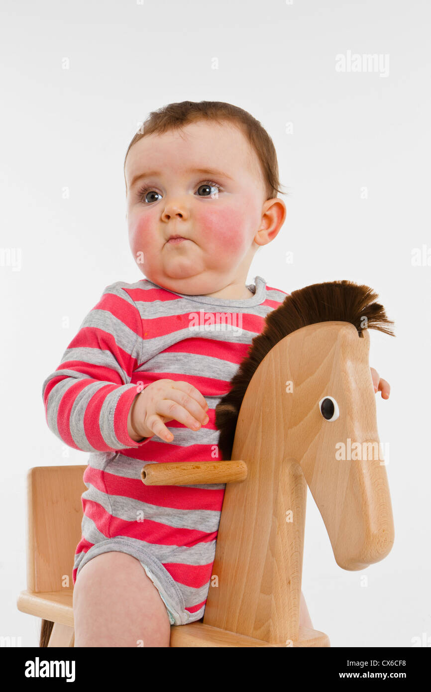 Baby on horse hi-res stock photography and images - Alamy