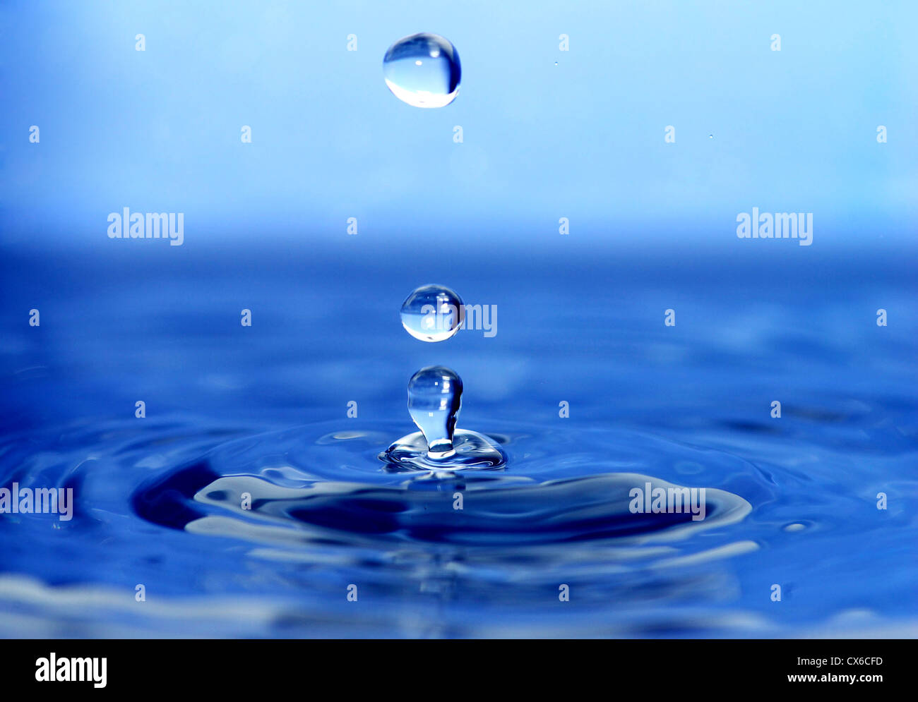 The round transparent drop of water falls downward Stock Photo - Alamy
