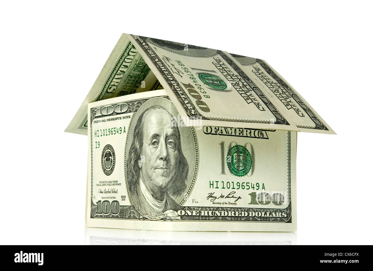 Money house on white background Stock Photo - Alamy