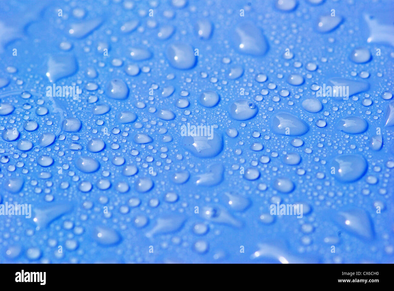 water drops on a blue background Stock Photo - Alamy