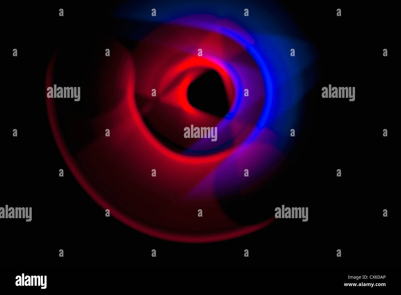 Blue and red lights creating an effect that looks like the shape of a ...