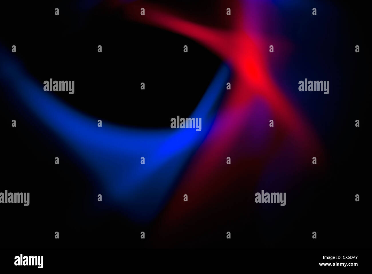 Abstract patterns of blue and red light on a black background Stock ...