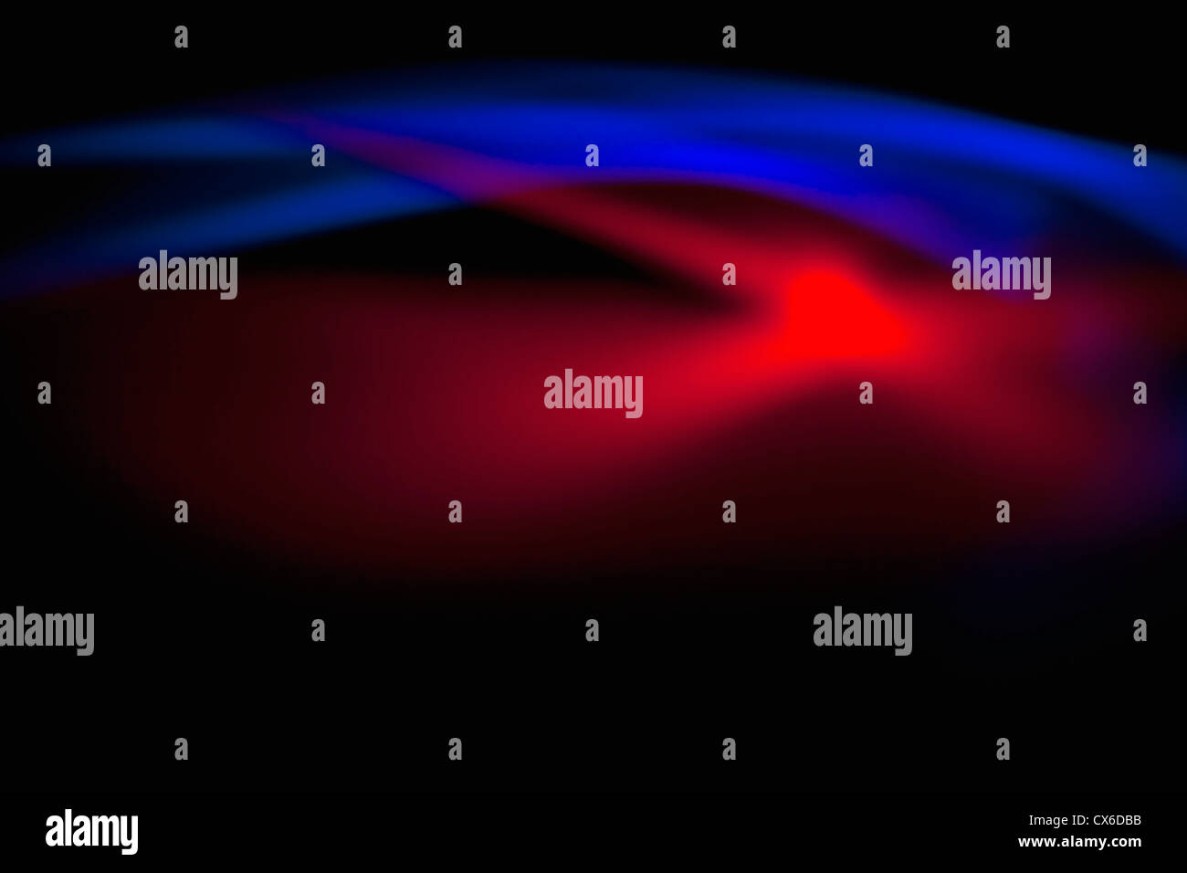 Abstract patterns of blue and red light on a black background Stock ...