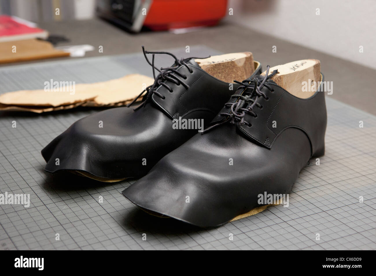 A pair of shoes being made Stock Photo - Alamy