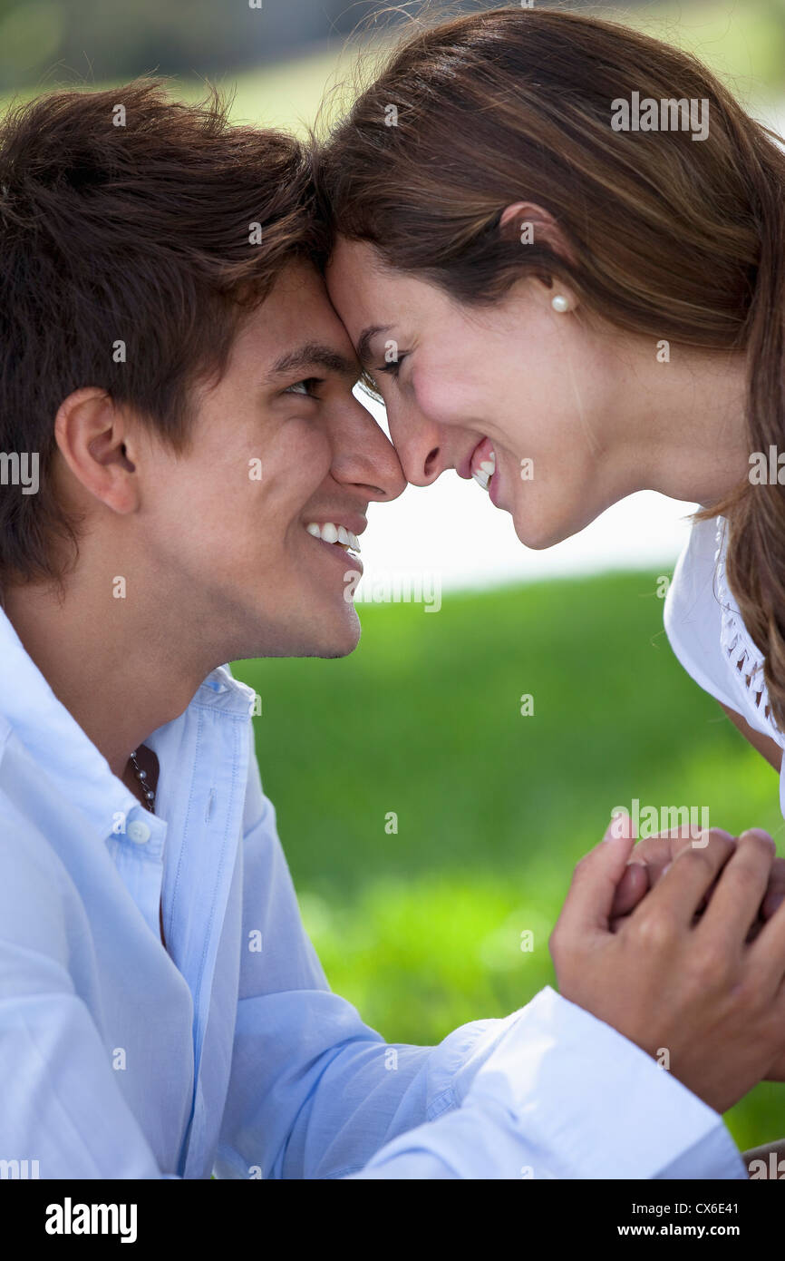 A young couple face to face Stock Photo - Alamy