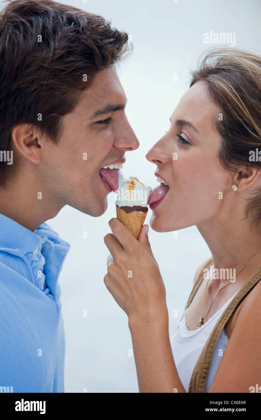 Young couple sharing ice cream hi-res stock photography and images - Alamy