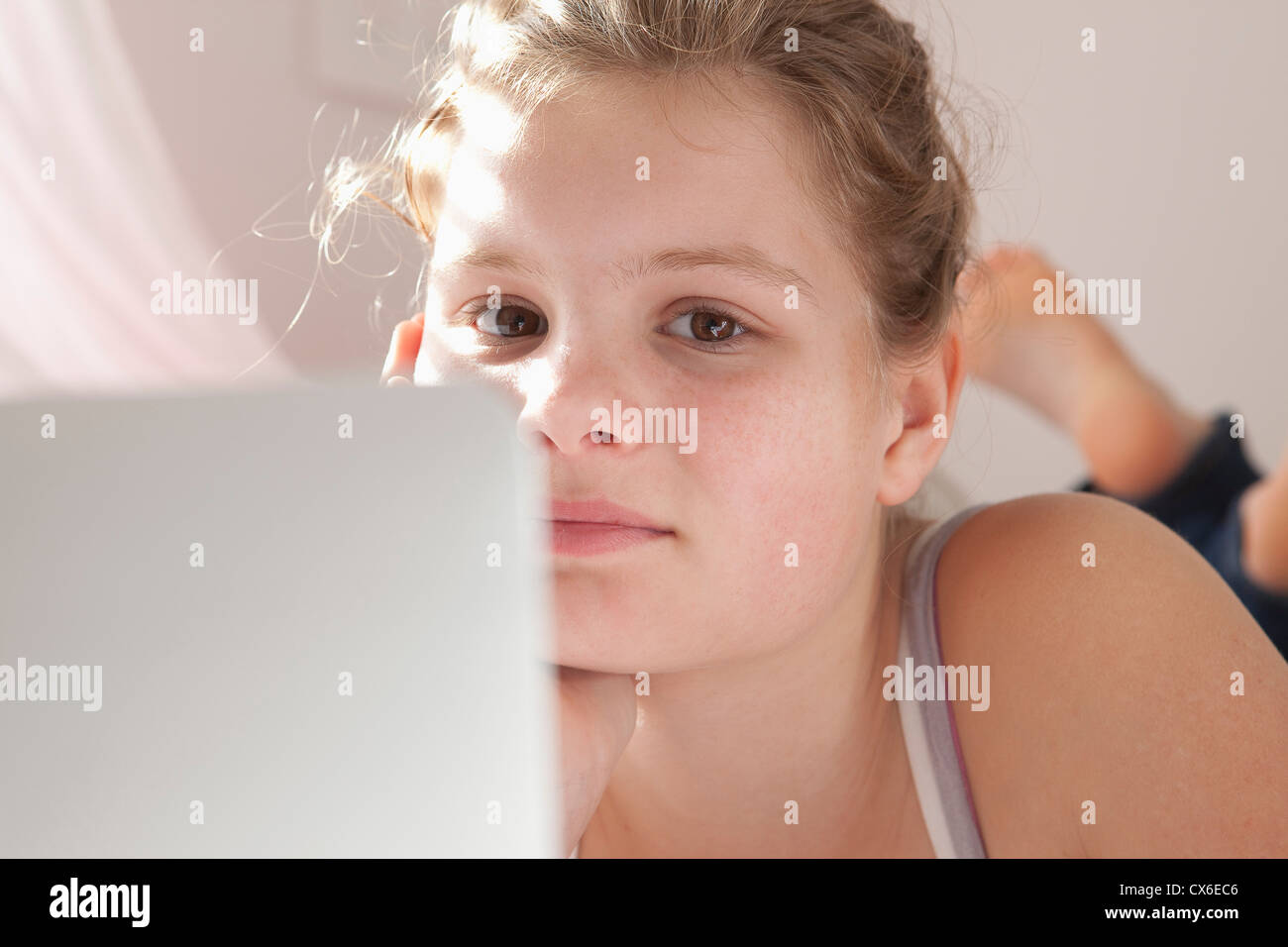 Girl at computer Stock Photo - Alamy