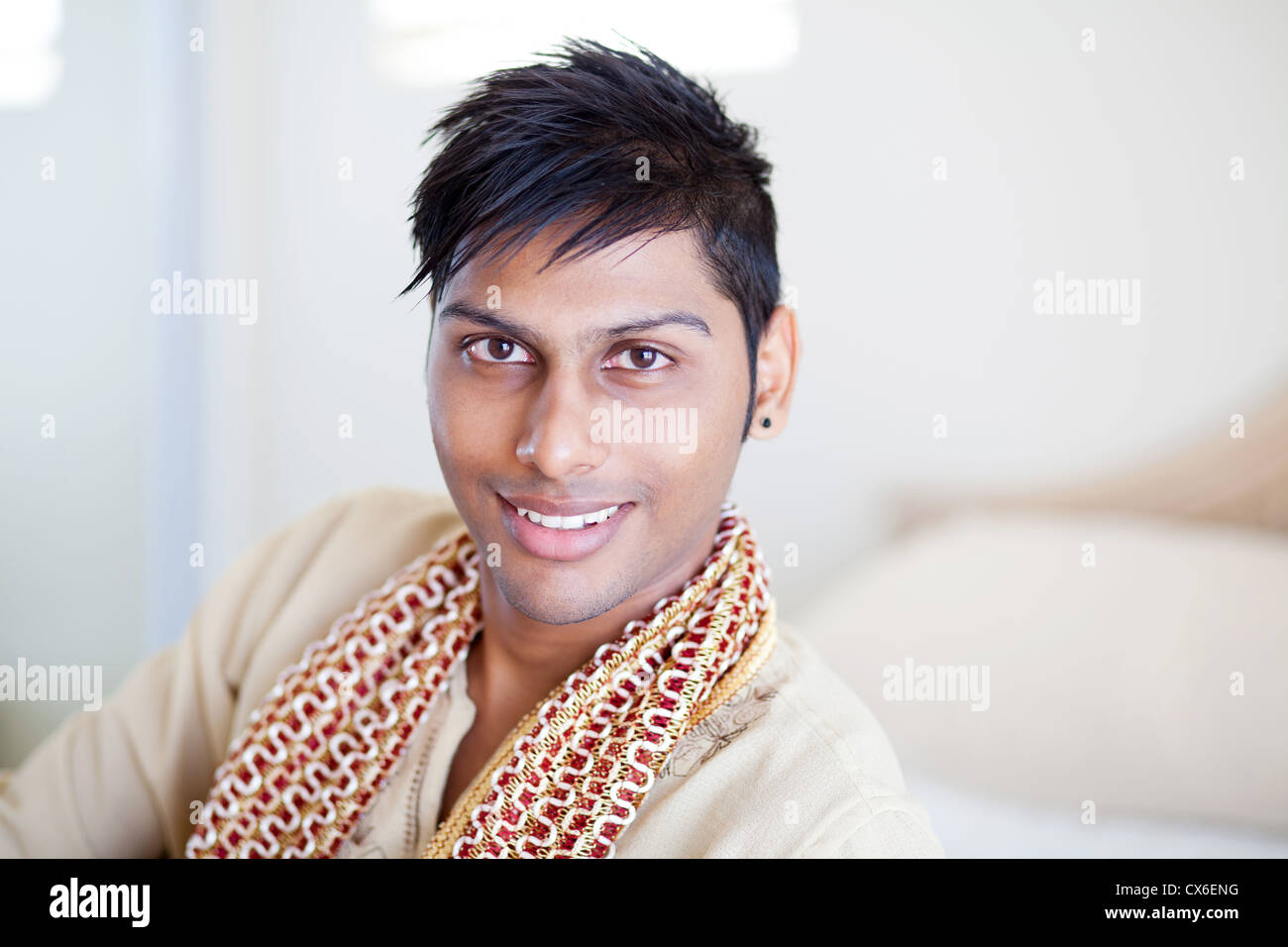 happy young Indian man in traditional clothing Stock Photo - Alamy