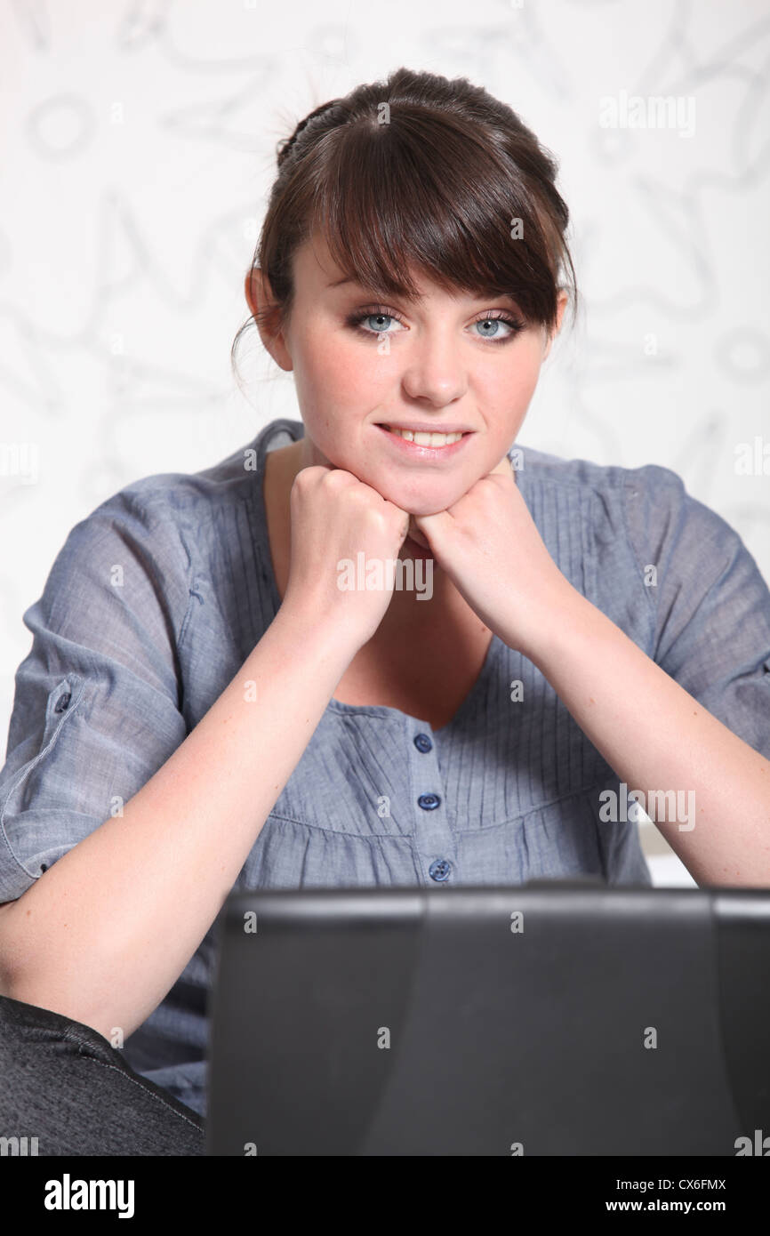 Brunette with computer Stock Photo - Alamy