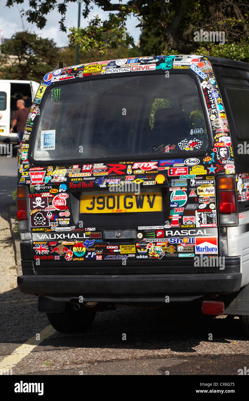 Rear view of Vauxhall Rascal camper van campervan covered in lots of ...