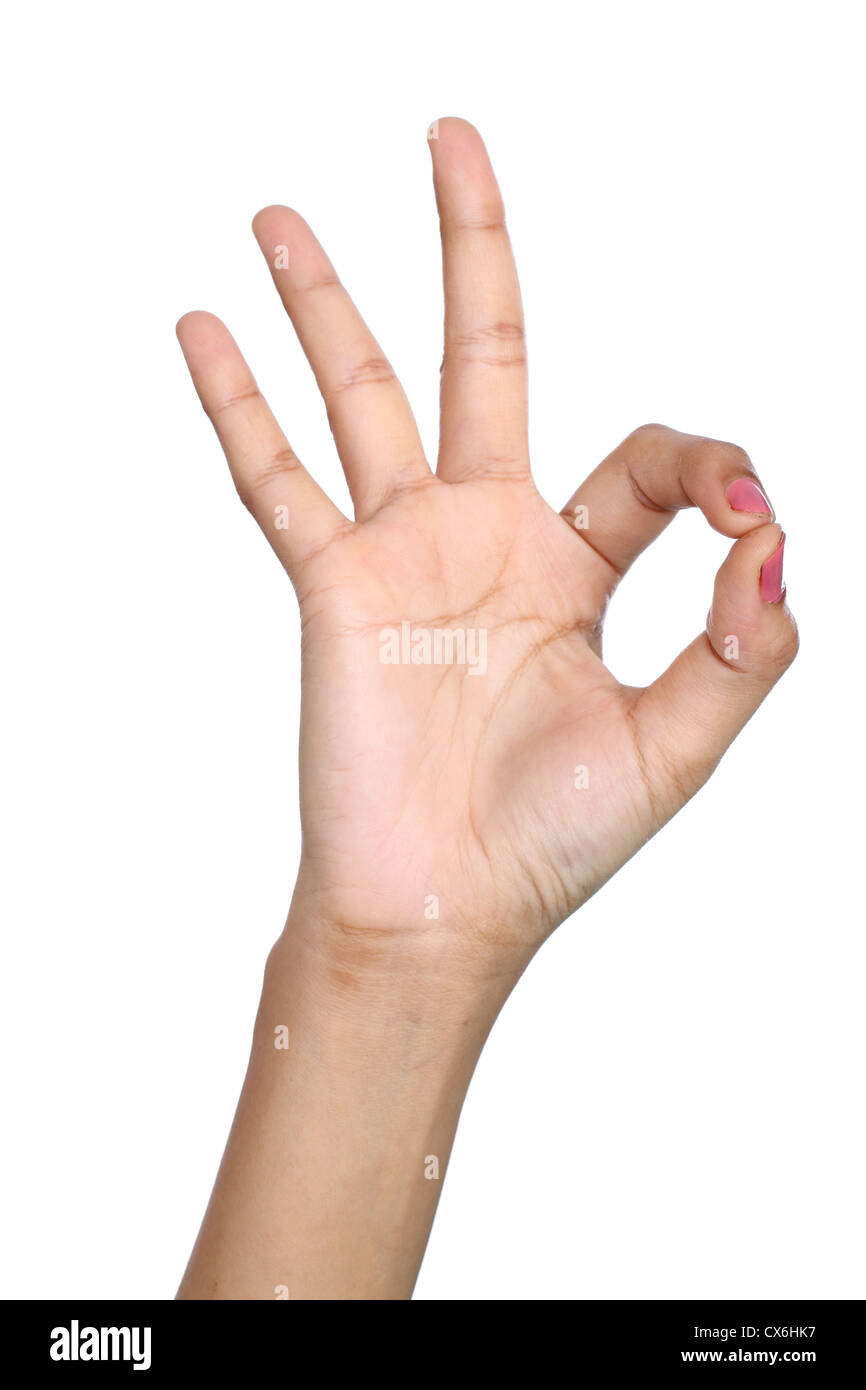 Hand showing Ok sign against white background Stock Photo - Alamy