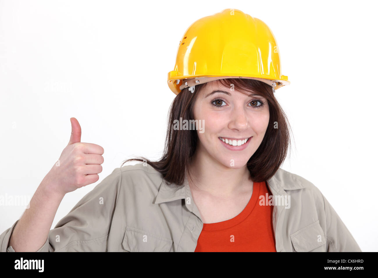 Positive female builder Stock Photo - Alamy