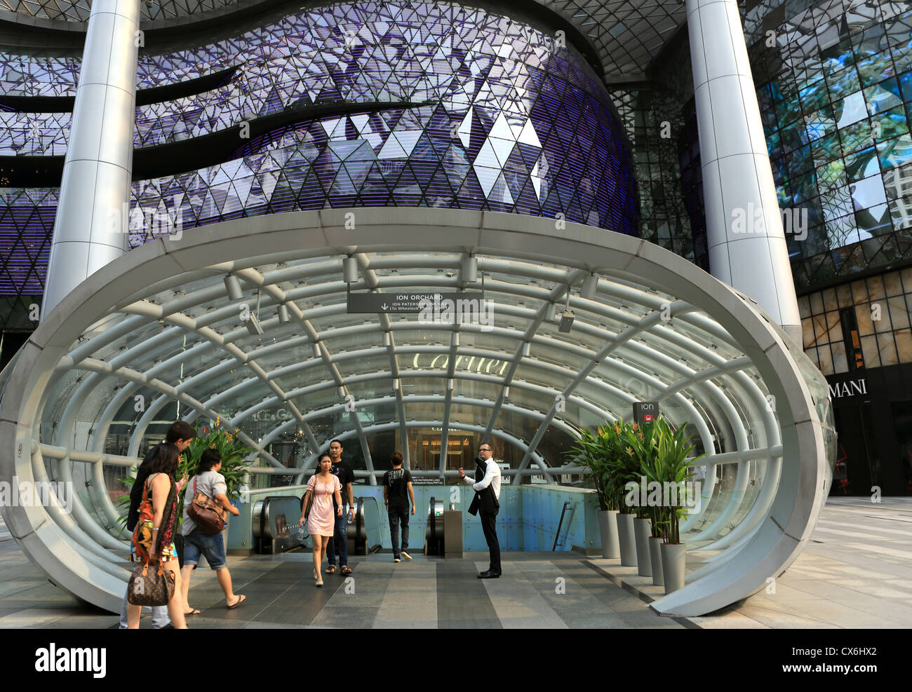 Entrance to underground shopping complex and MRT at ION Orchard in Orchard Road, Singapore Stock ...