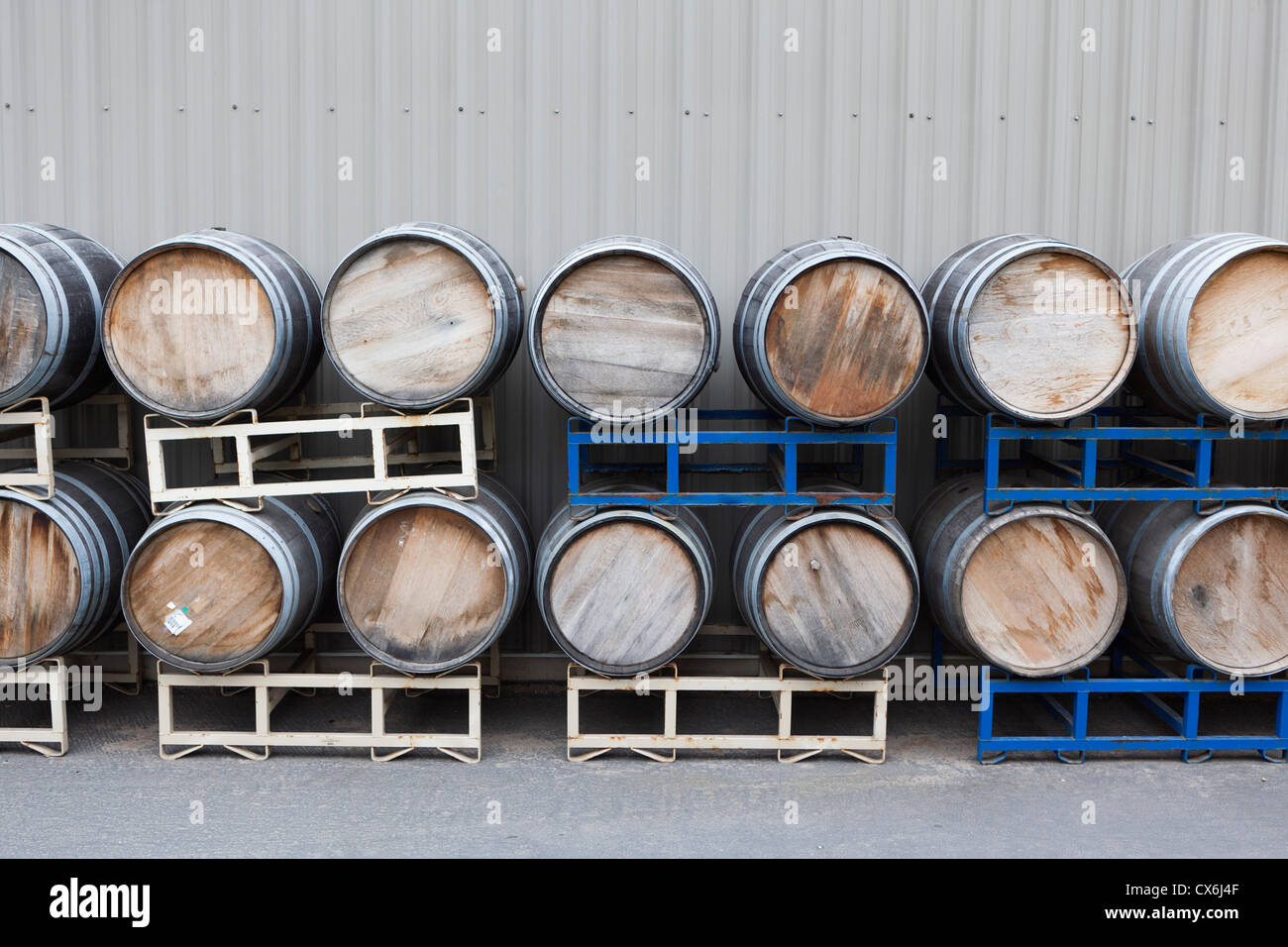 Stacked wine barrels at a winery Stock Photo - Alamy