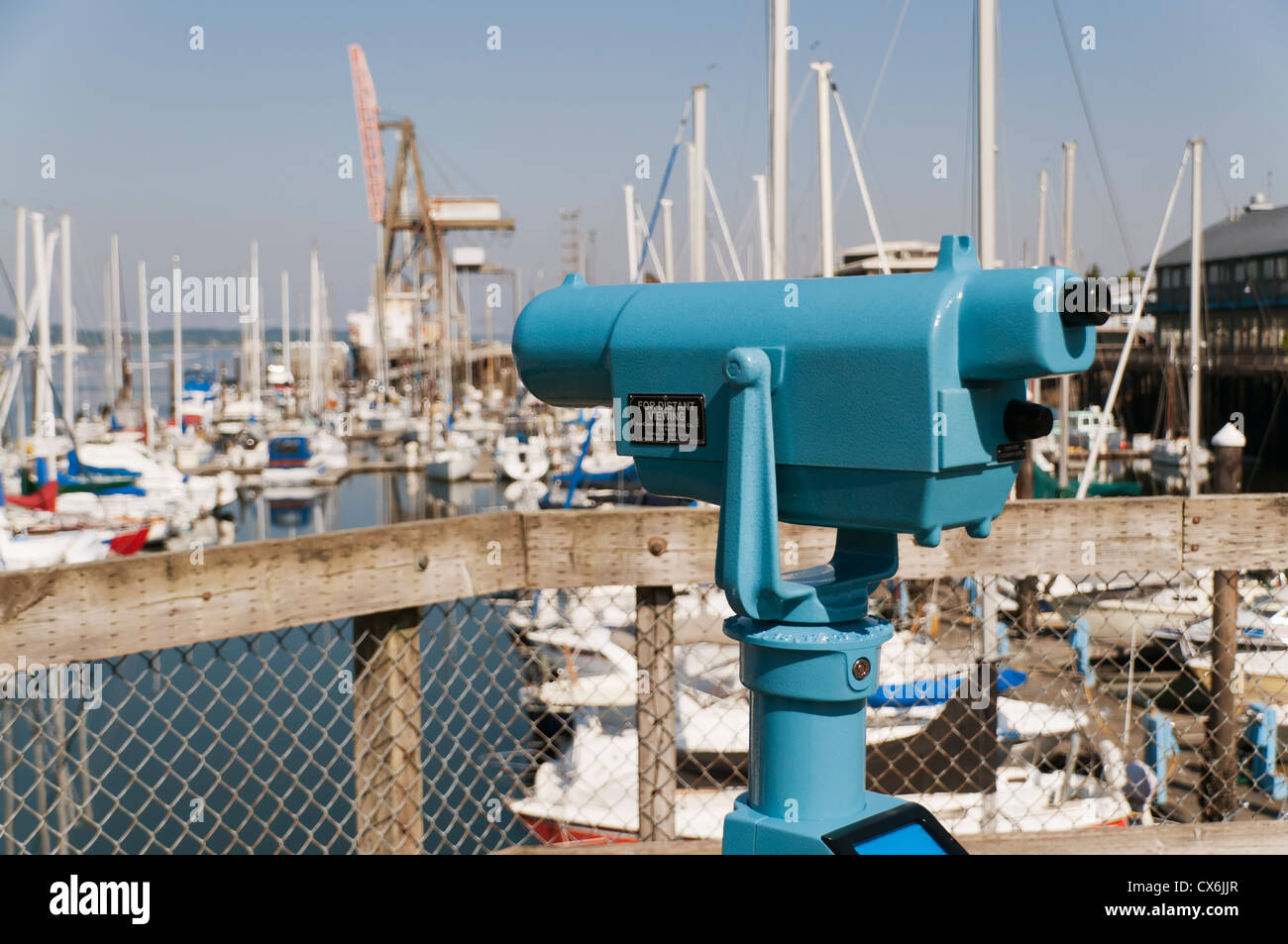 A distance viewing telescope mounted on a viewing platform on the ...