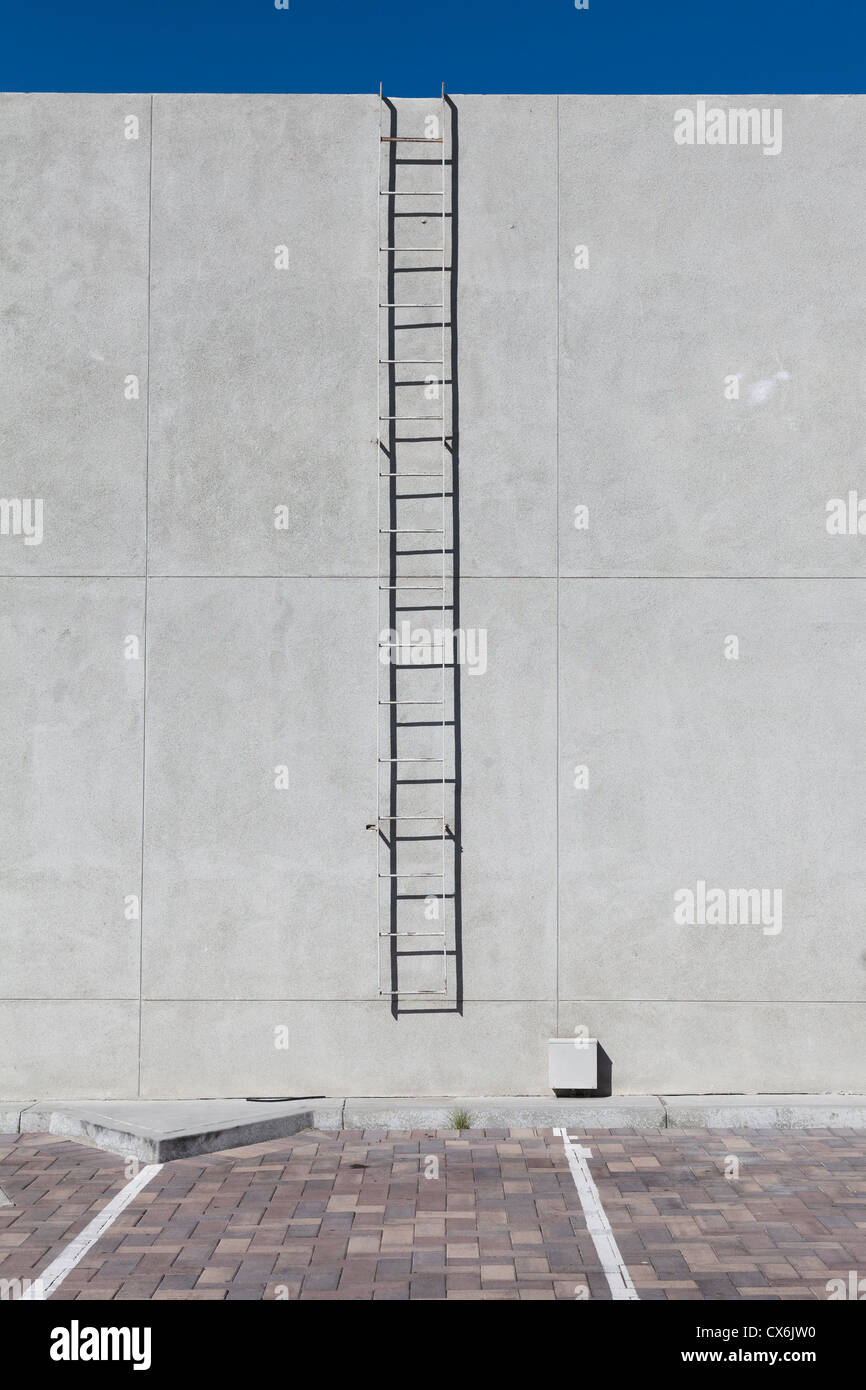 A ladder on the side of a building Stock Photo - Alamy