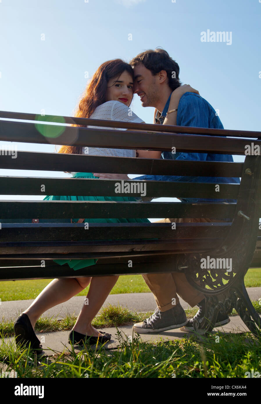 Intimate seated couple hi-res stock photography and images - Alamy