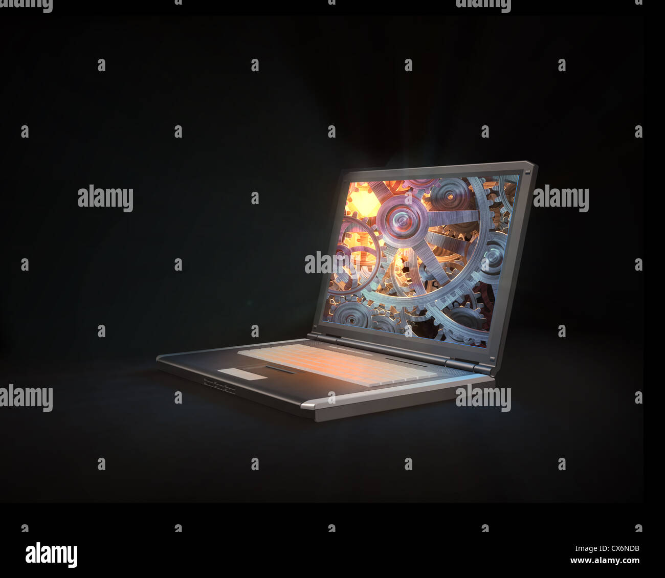 Open laptop with a gear and cog wheel screen - computer hardware ...