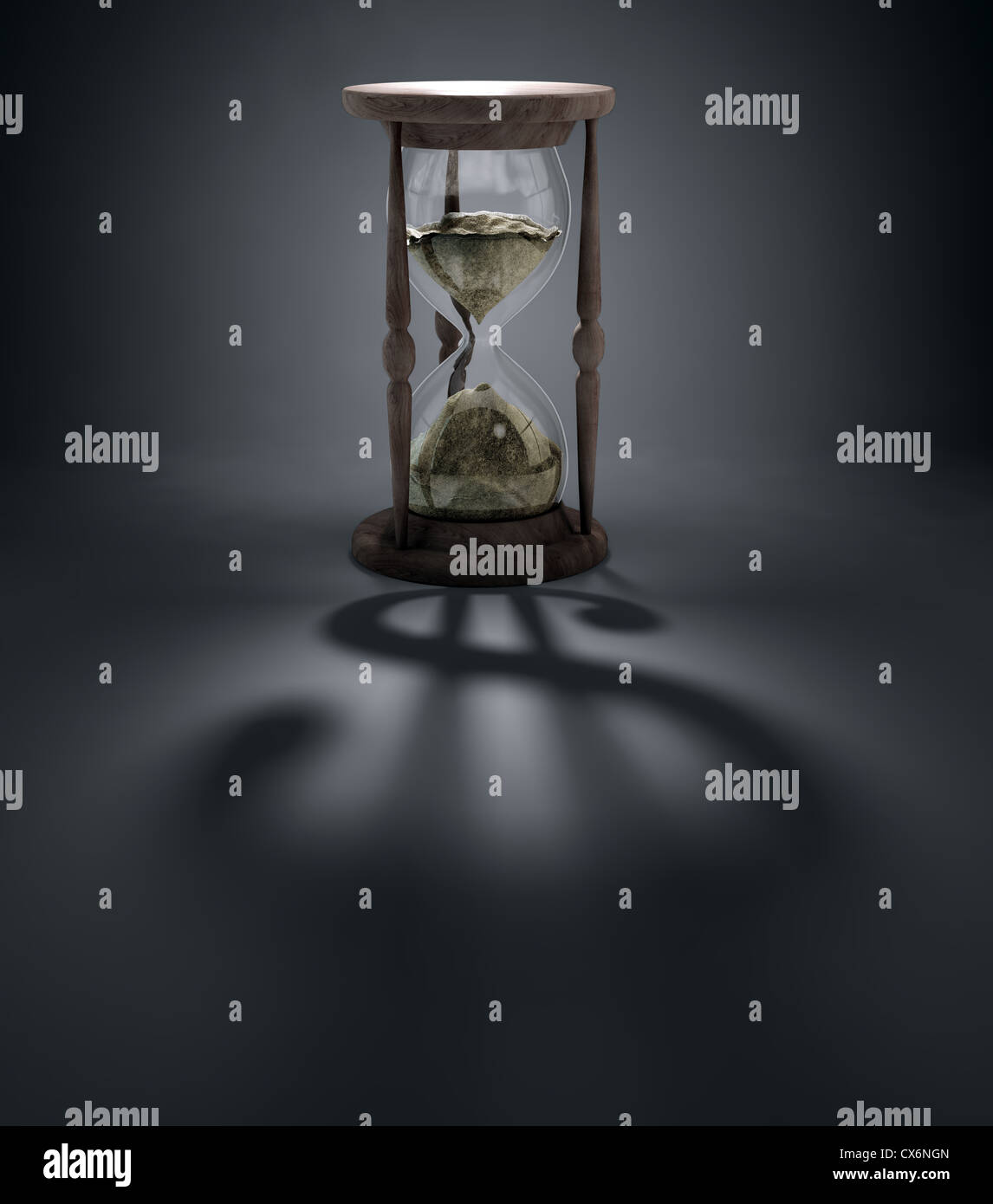 An hourglass casting a shadow of a dollar sign - time is money concept ...