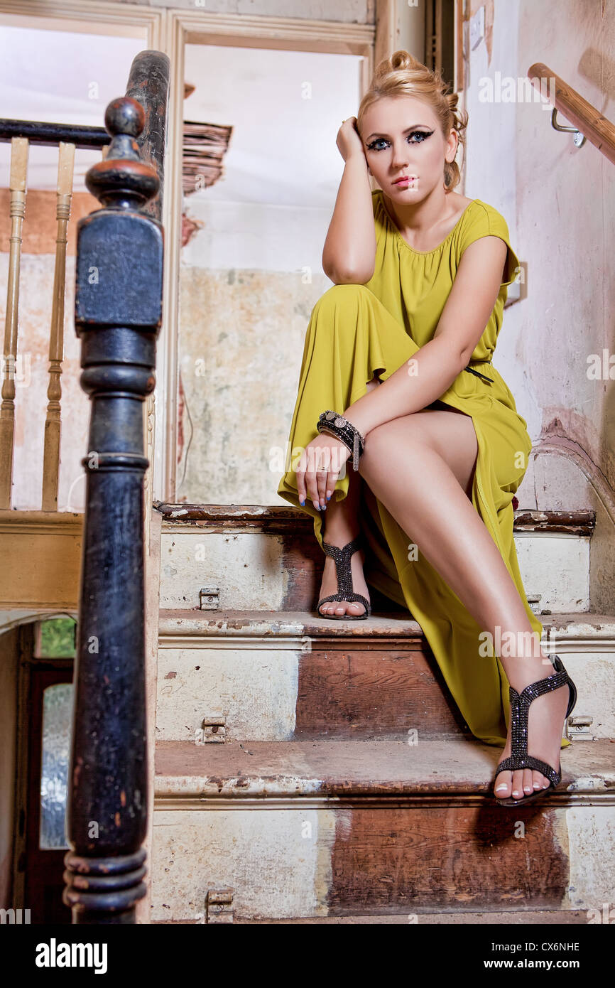 Beautiful woman on the stairs Stock Photo - Alamy