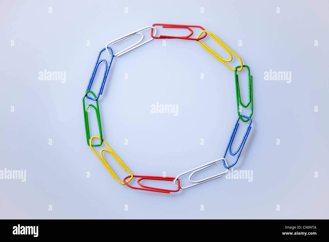 Multi colored paperclips arranged in a circle Stock Photo - Alamy