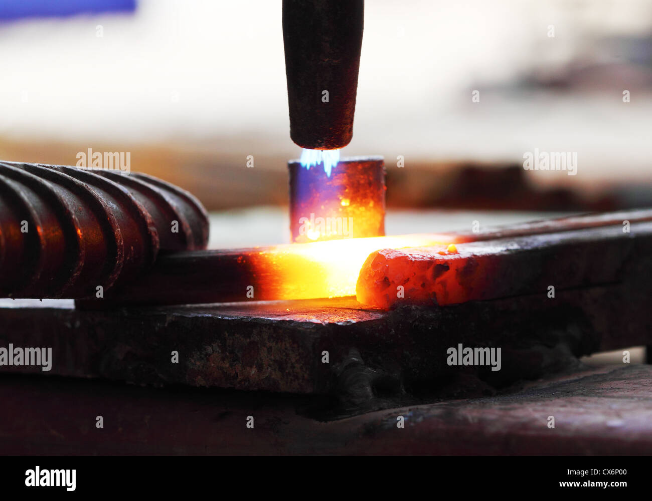 Gas heating cutting metal using torch and bending square bar Stock ...
