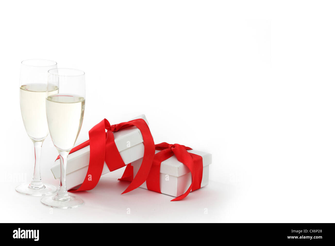 white gift with red ribbon Stock Photo - Alamy