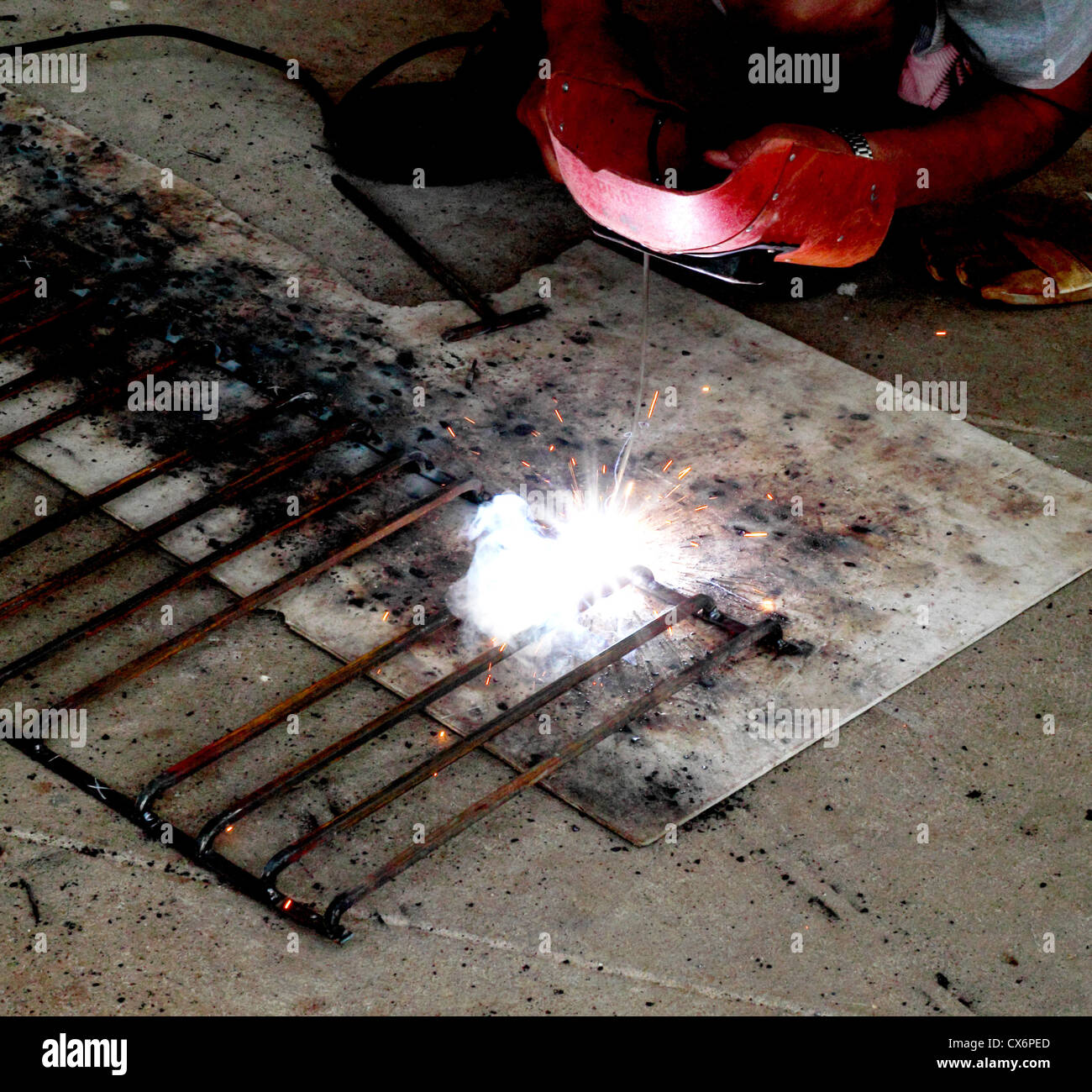 electric welding connecting square bar metal Stock Photo - Alamy
