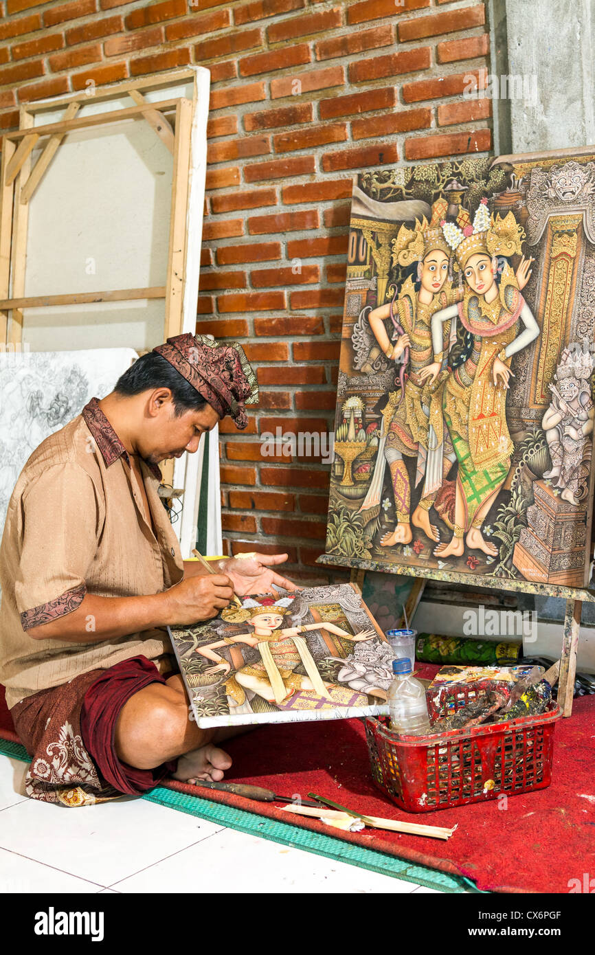 Painter drawing on easel in gallery, Ubud, Bali, Indonesia Stock Photo ...