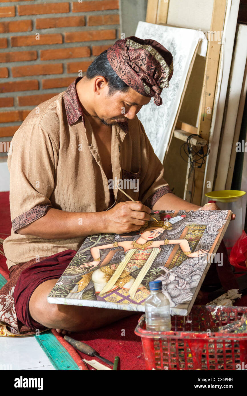 Painter drawing on easel in gallery, Ubud, Bali, Indonesia Stock Photo ...