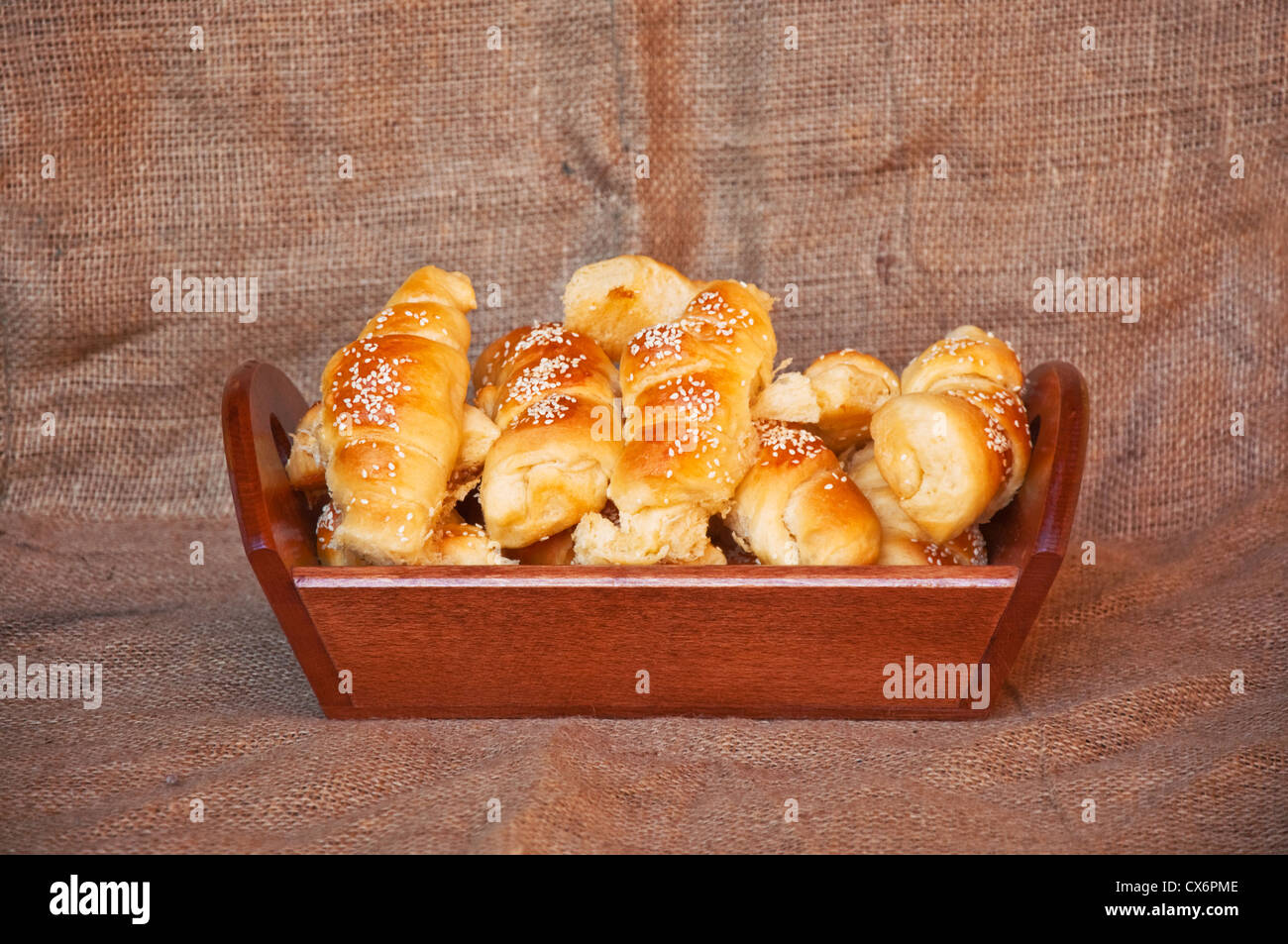 Tasty fresh and warm home made bread loafs in a wooden punnet Stock ...
