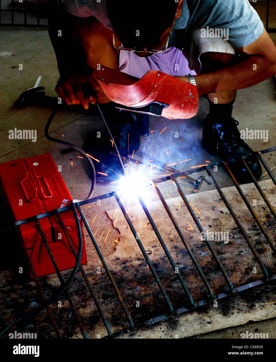 electric welding connecting square bar metal Stock Photo - Alamy
