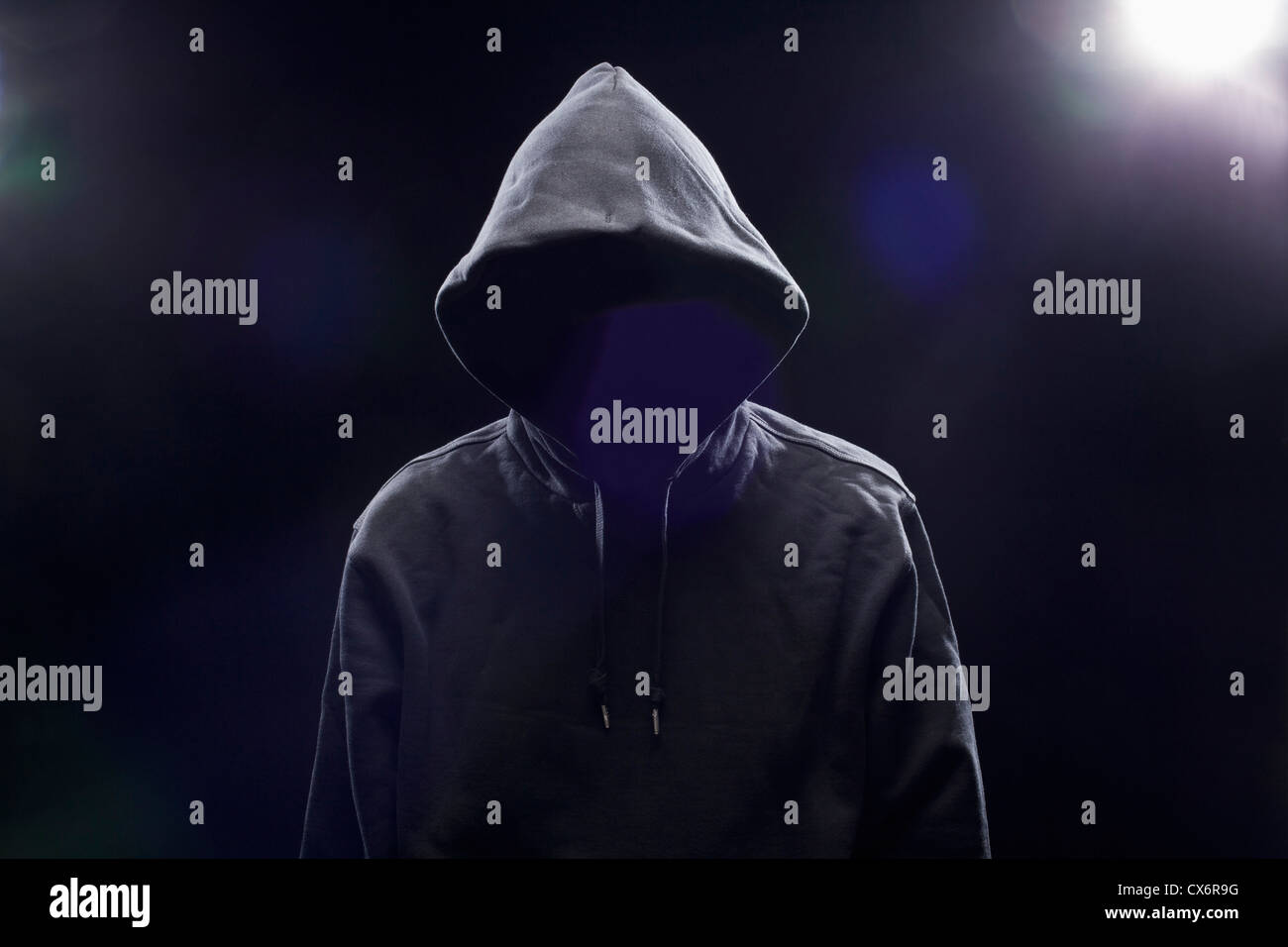 Hidden Man in hooded top Stock Photo - Alamy