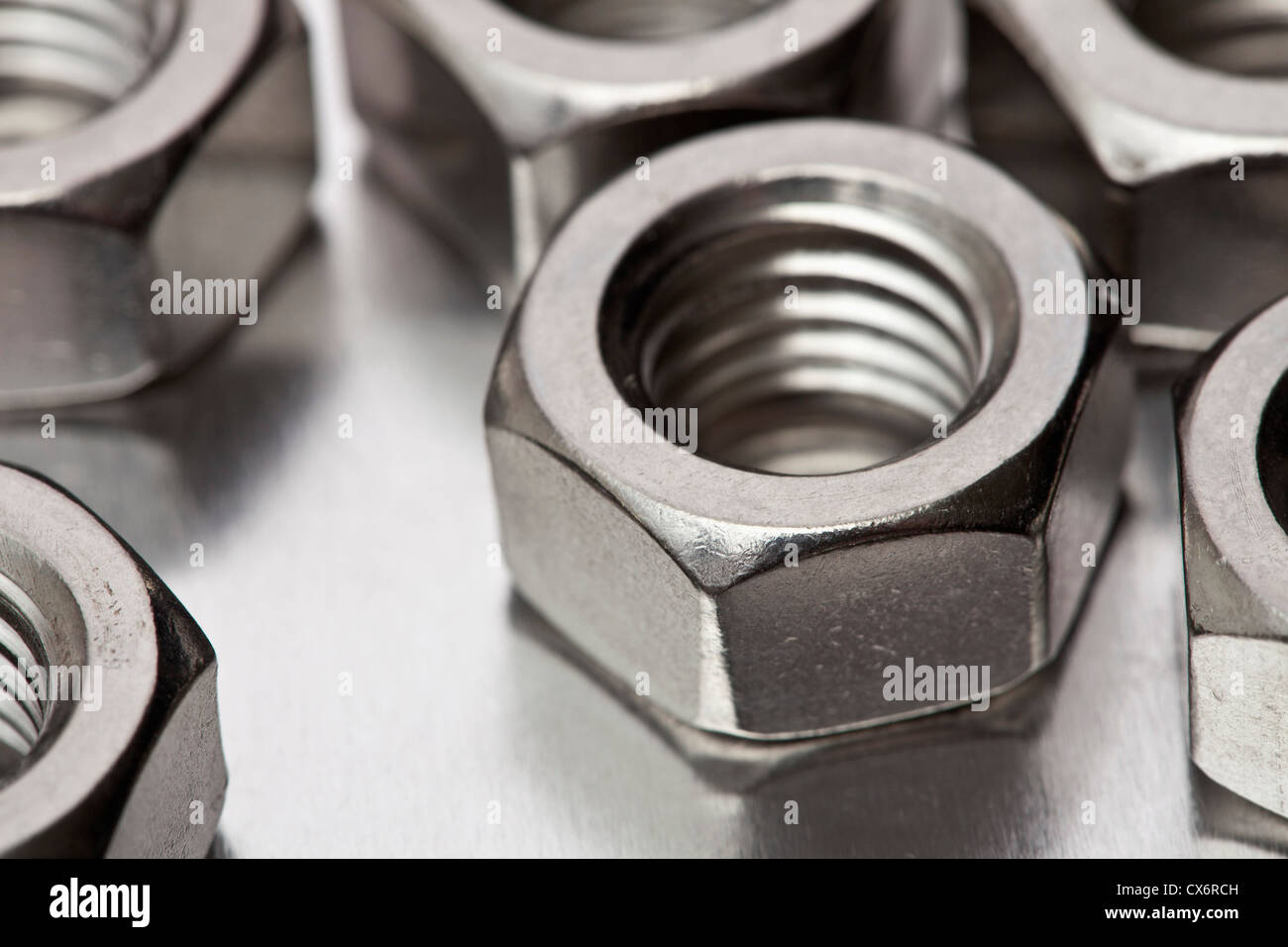 Metal nuts, close-up Stock Photo - Alamy