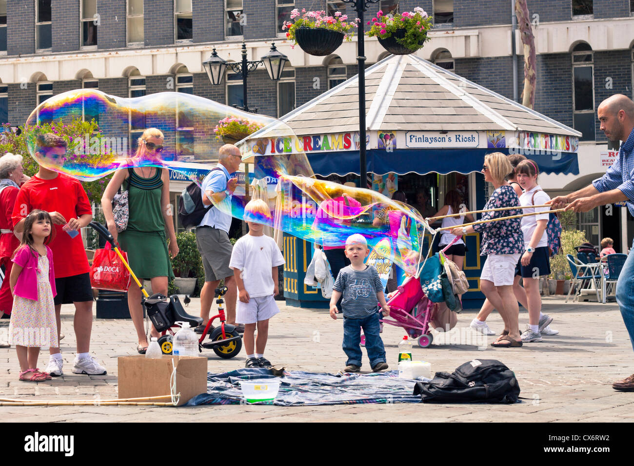 People having fun with big soap bubbles. 25 May 2012, Casemates Square ...