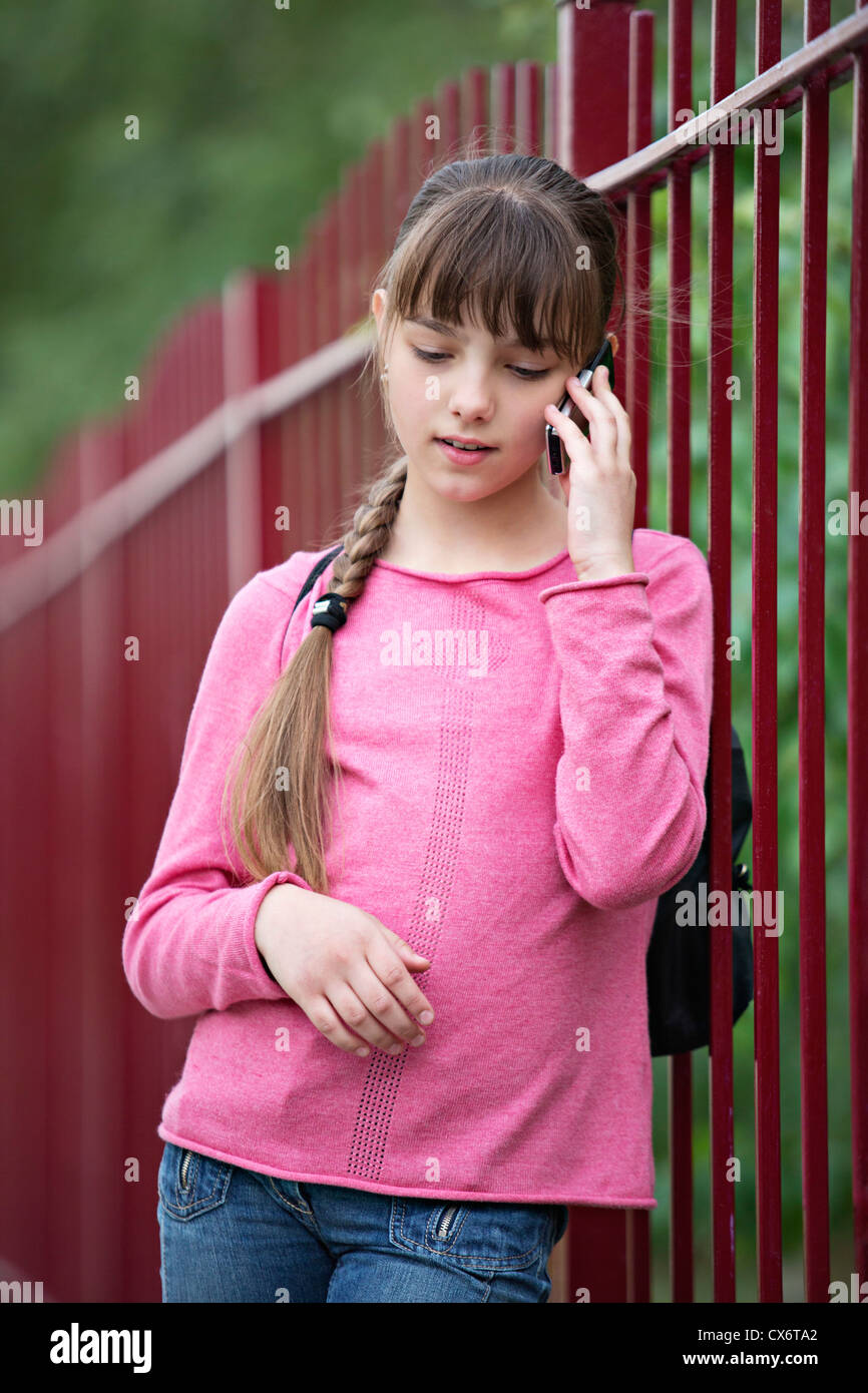 A girl using a mobile phone Stock Photo - Alamy