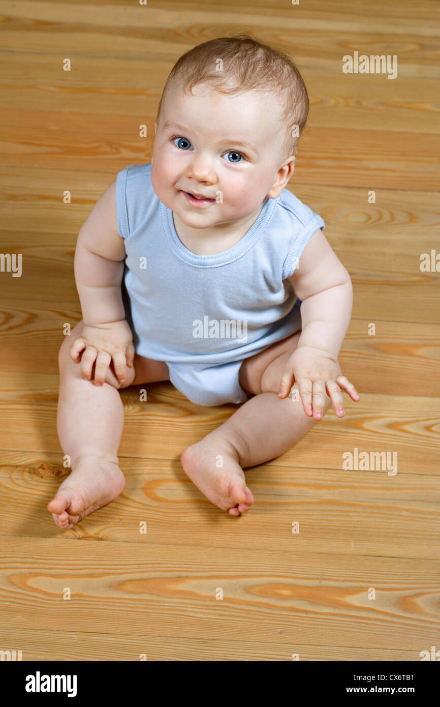 Portrait of a baby sitting Stock Photo - Alamy