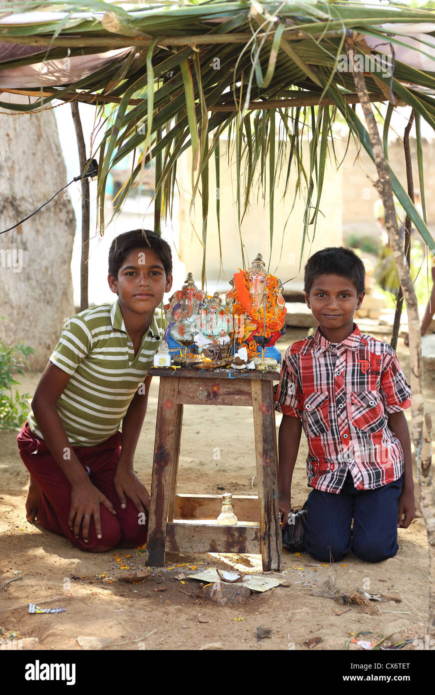 Indian boys with little self made Ganesh temple South India Stock Photo ...