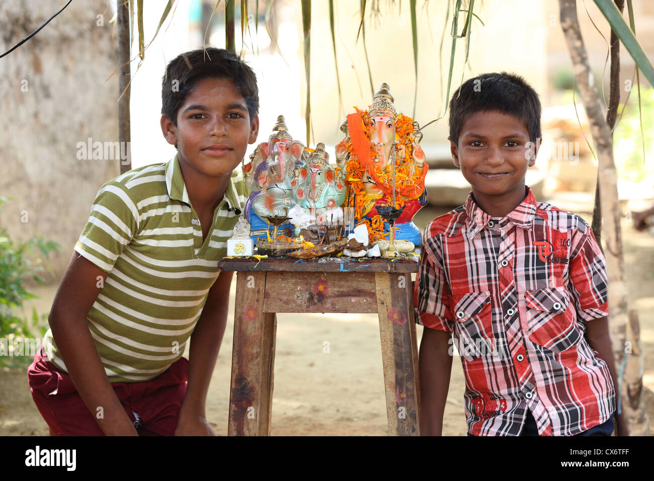 Indian boys with little self made Ganesh temple South India Stock Photo ...