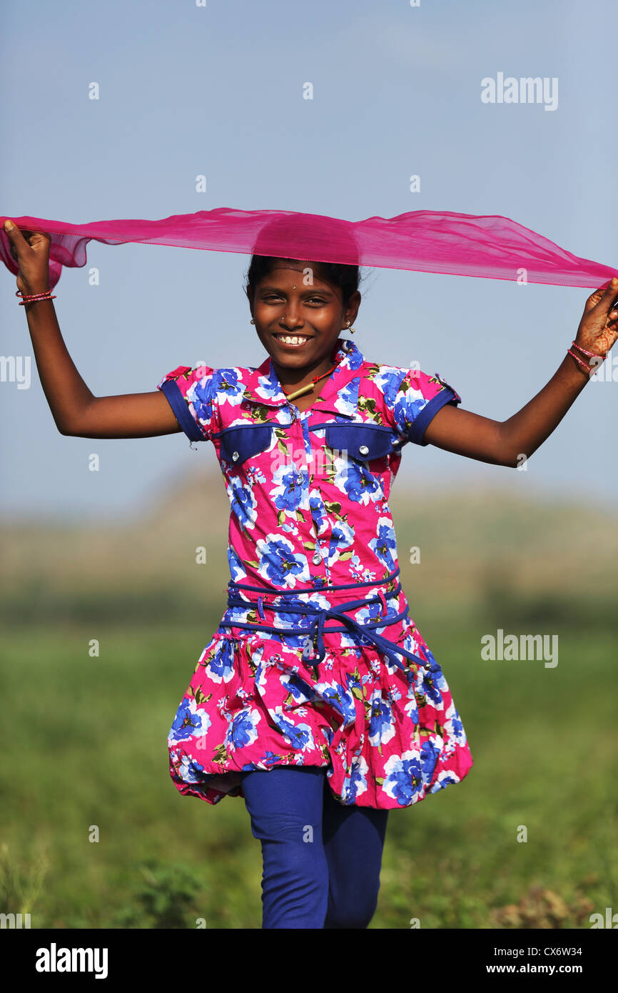 Indian girl running in field hi-res stock photography and images - Alamy