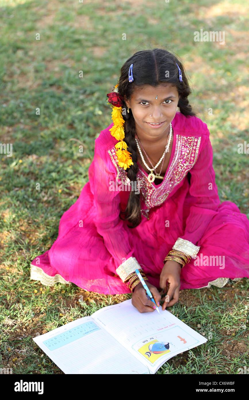 Indian girl writing in her notebook Andhra Pradesh South India Stock ...