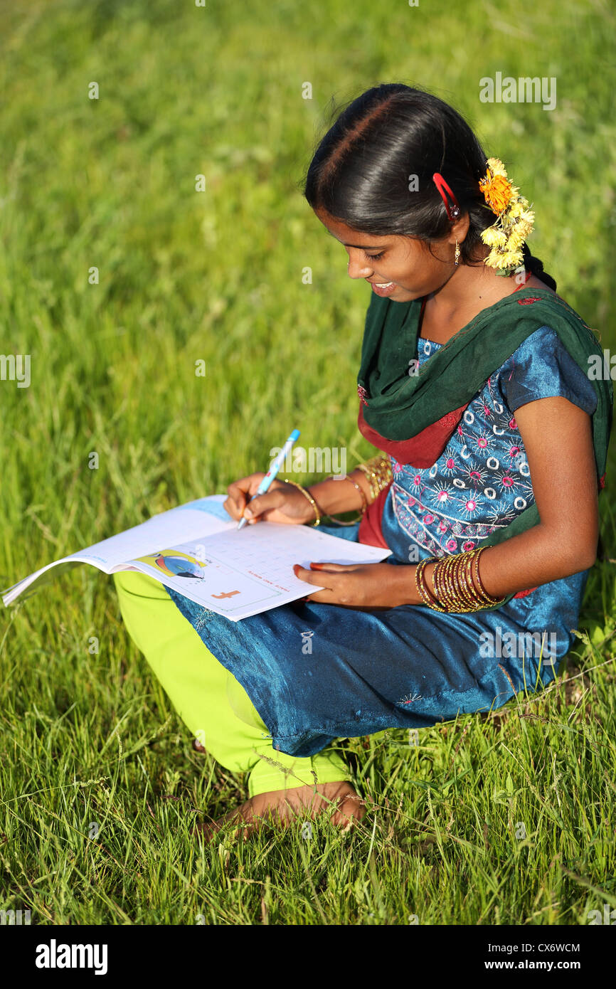 Indian girl writing in her notebook Andhra Pradesh South India Stock ...