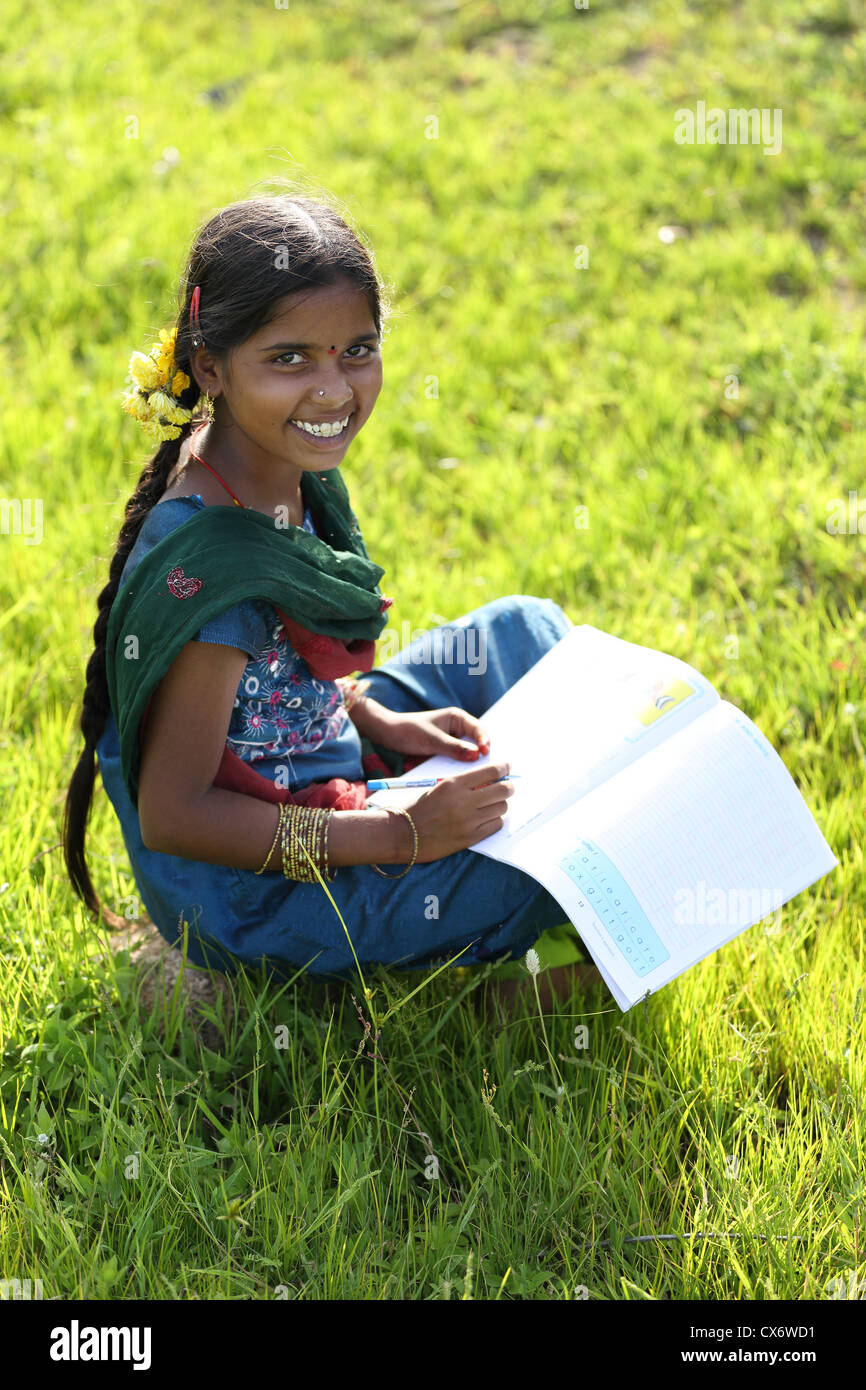Indian girl writing in her notebook Andhra Pradesh South India Stock ...