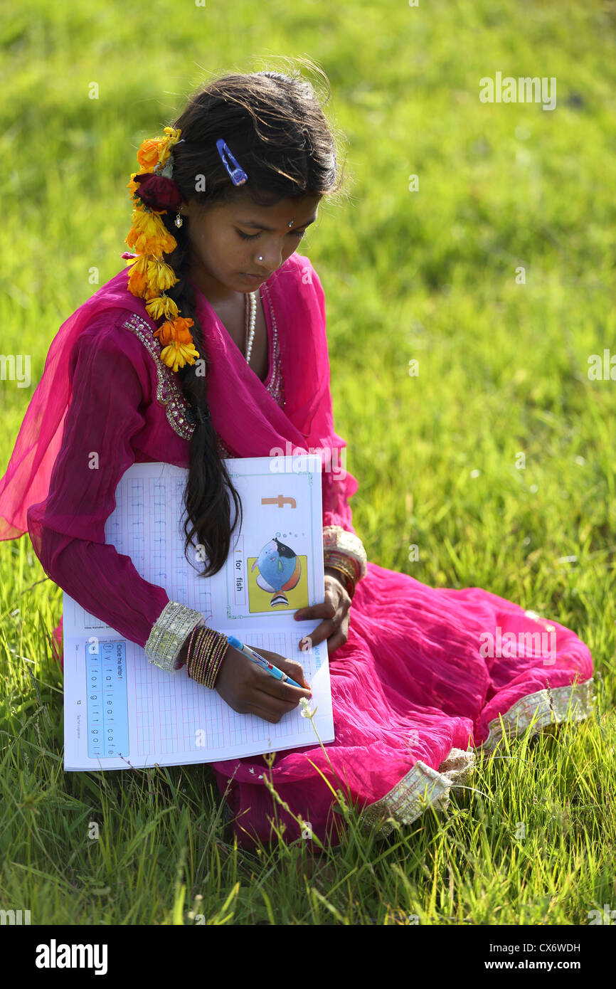 Indian girl writing in her notebook Andhra Pradesh South India Stock ...