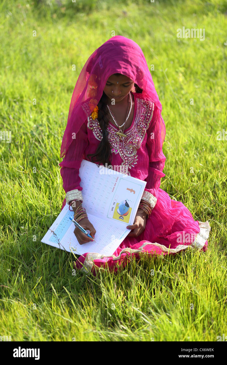 Indian girl writing in her notebook Andhra Pradesh South India Stock ...