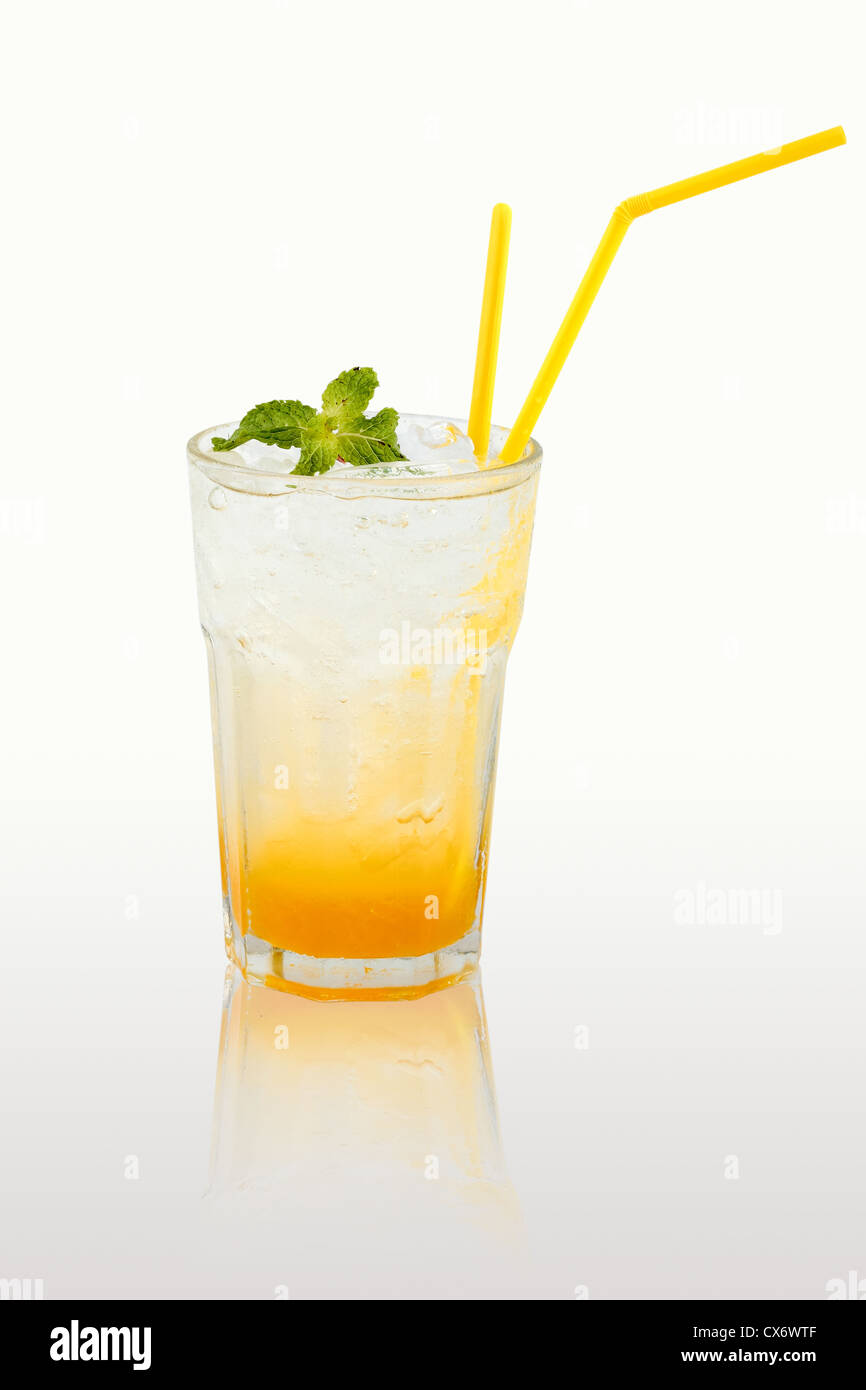 A glass of colorful punch with ice on isolate background Stock Photo ...