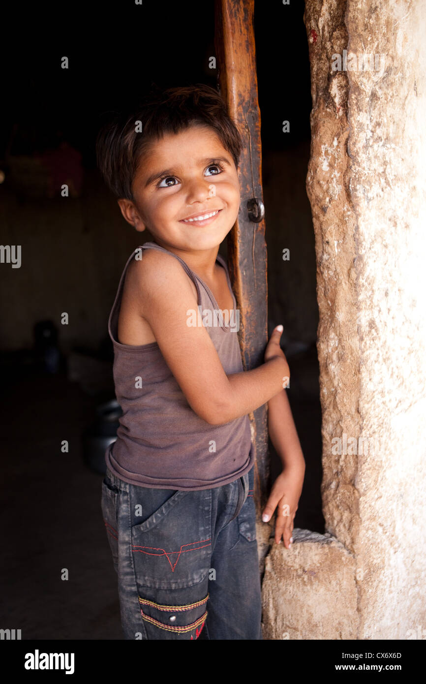 Indian boy in a rural village in the Thar desert, Rajasthan Stock Photo ...