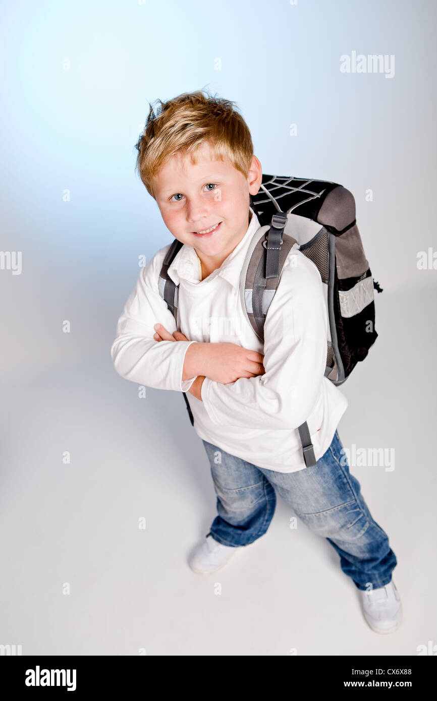 a first grader school boy with school bag Stock Photo - Alamy
