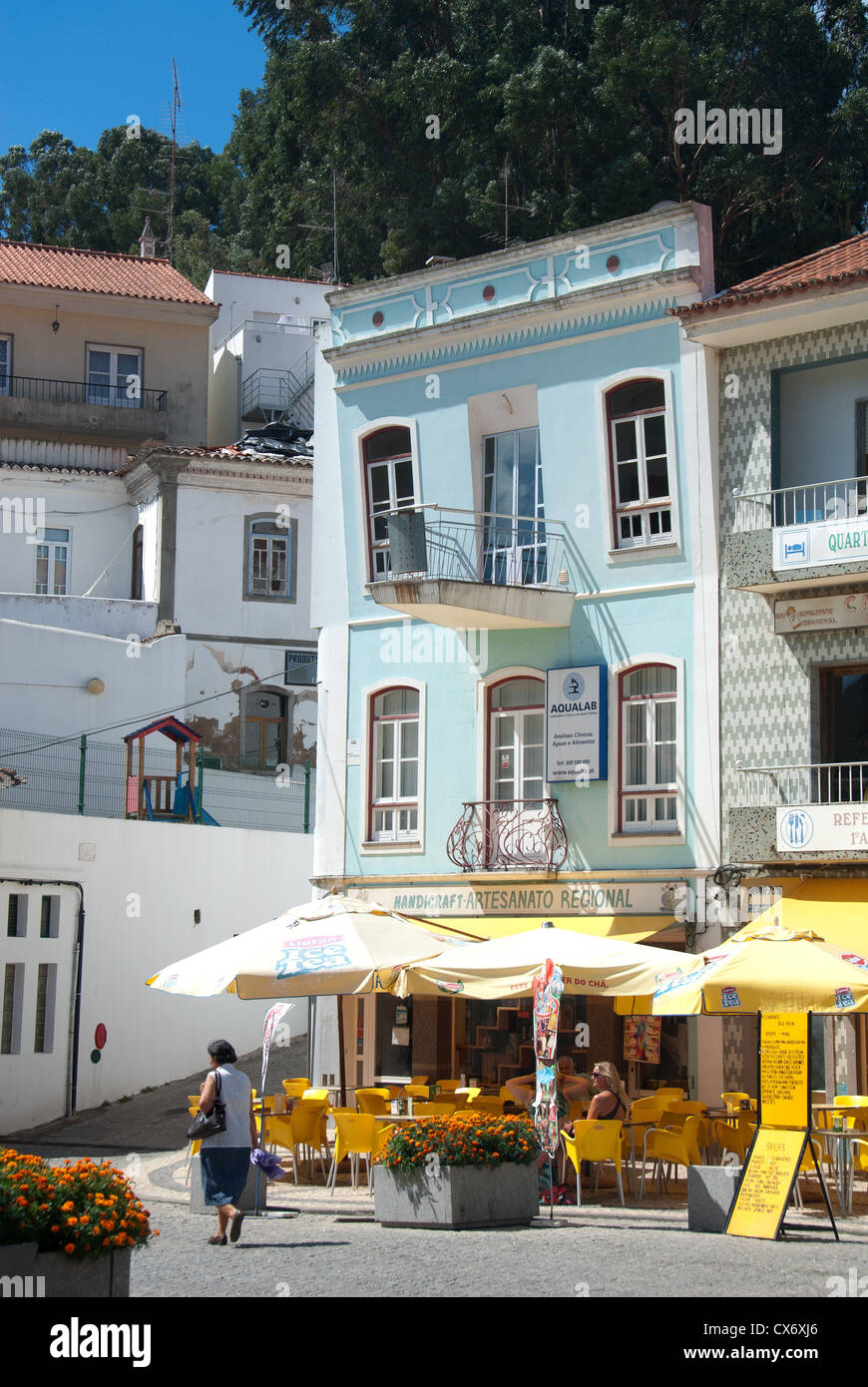 ALGARVE, PORTUGAL. A street and cafe in the hill town of Monchique ...